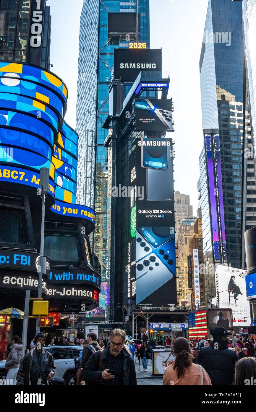 The skyscrapers and office buildings in Times Square are covered in ...