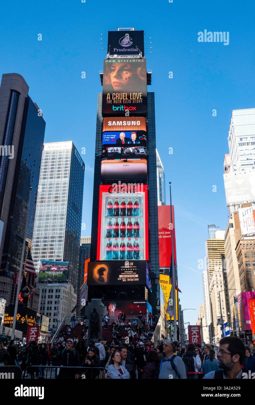 The skyscrapers and office buildings in Times Square are covered in ...