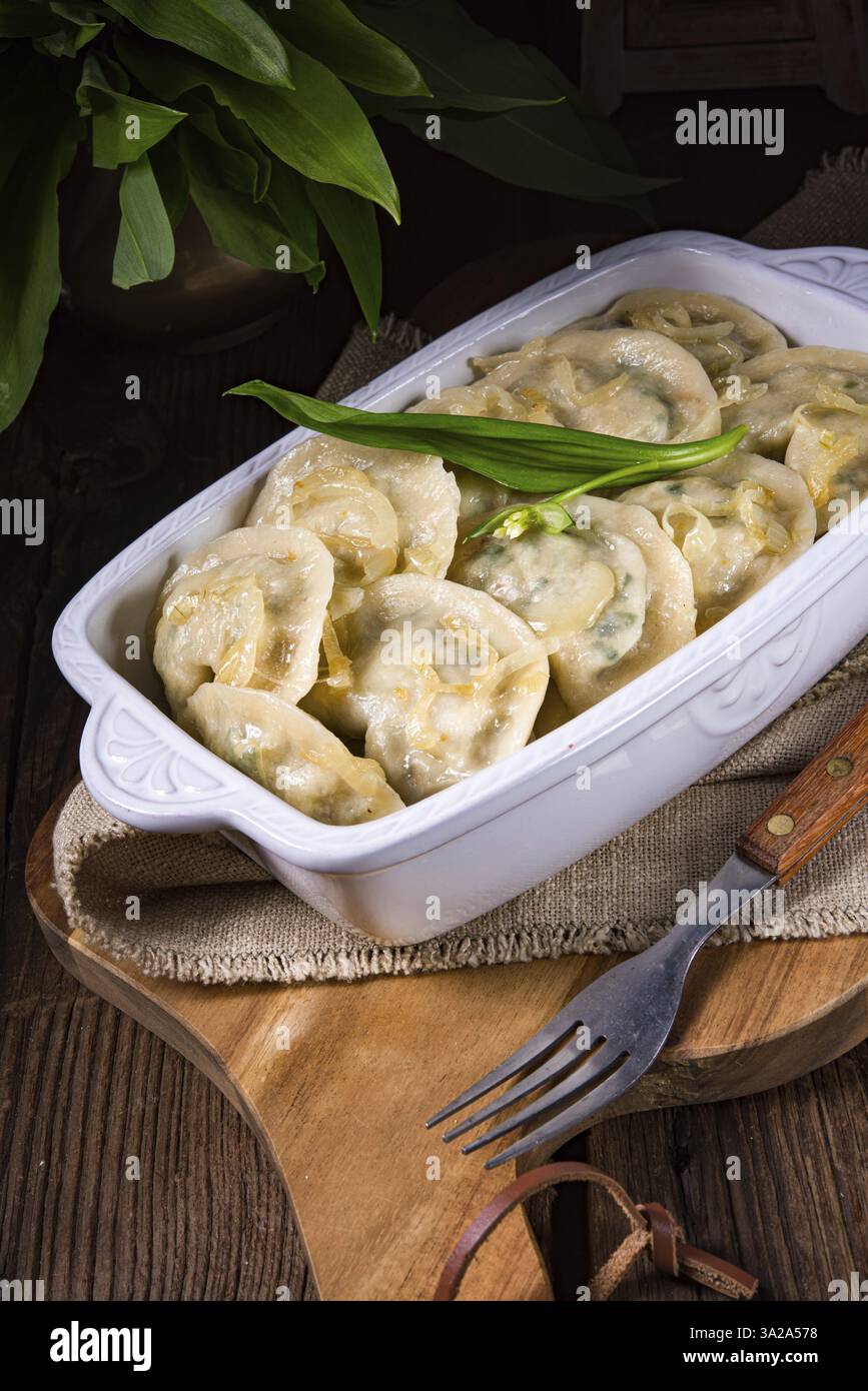 Pierogo with wild knob of cheese filling Stock Photo - Alamy