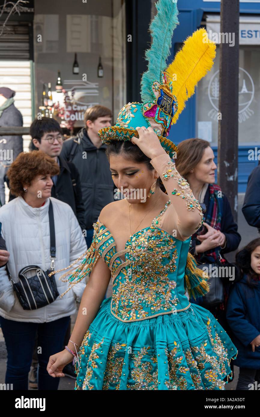 Vibrant dancer showcases stunning costume during Paris Carnival 2025 ...