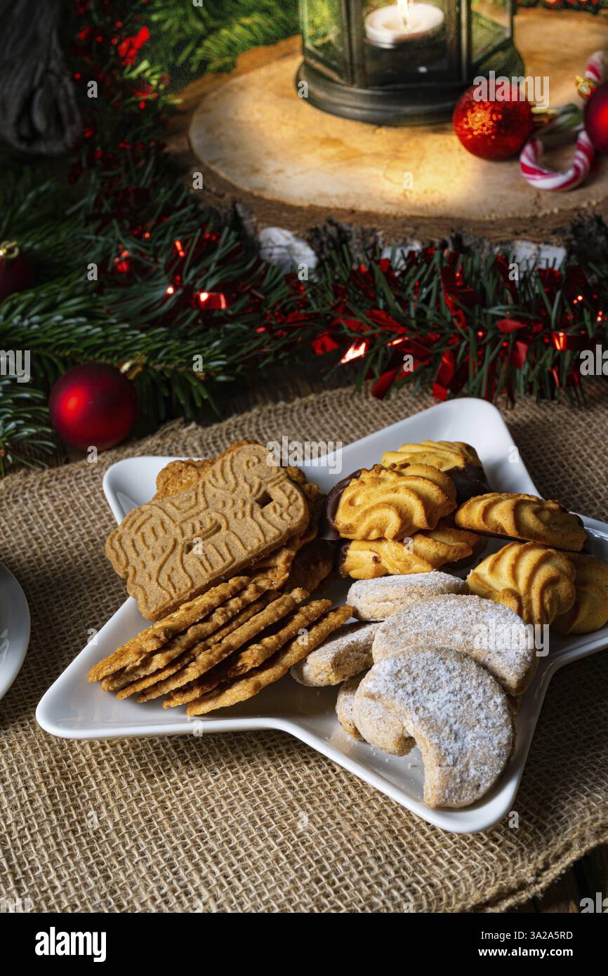 Different types of biscuits with rustic Christmas decorations Stock ...