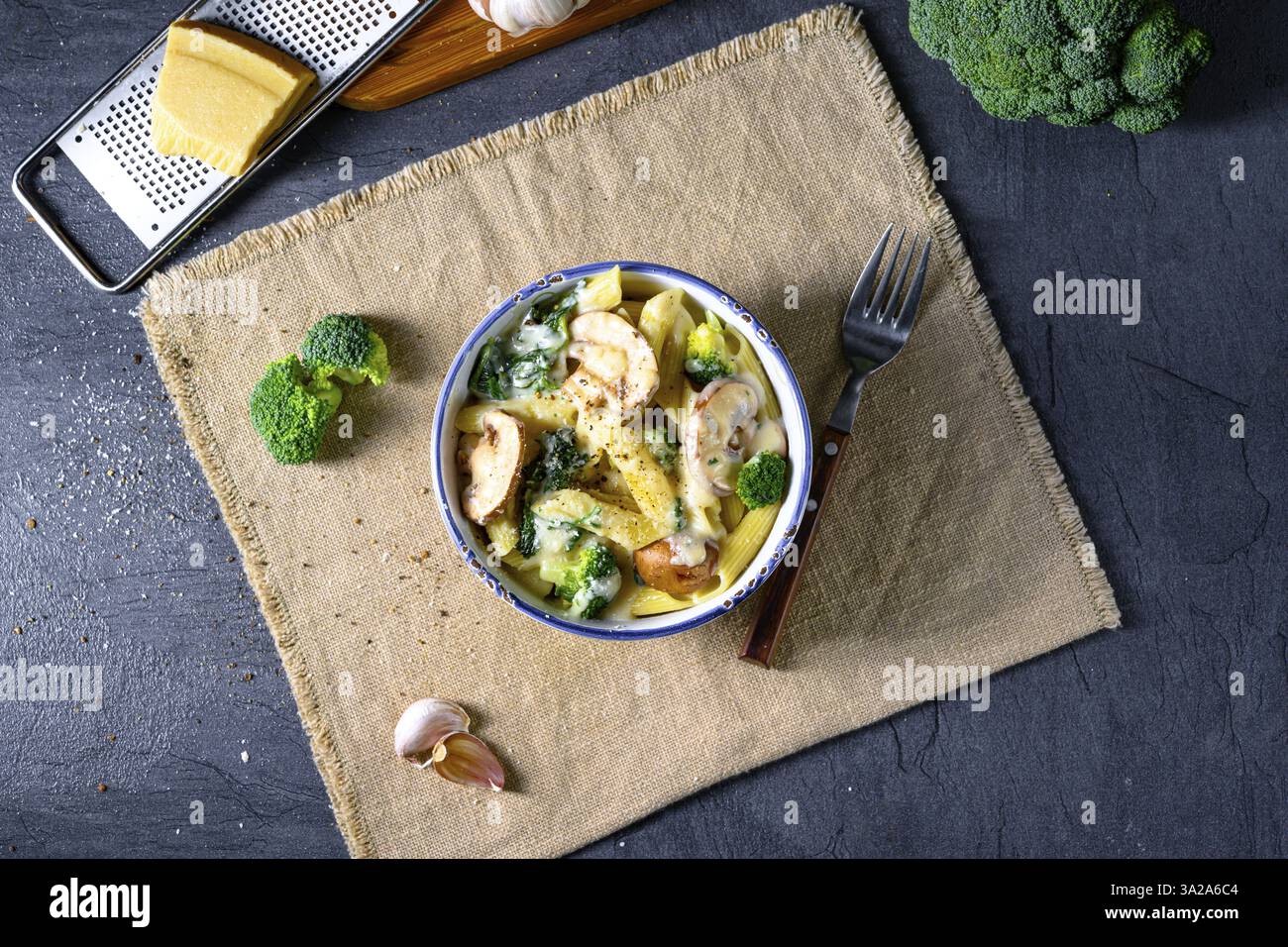 Real pasta with mushrooms, spinach and broccoli Stock Photo - Alamy