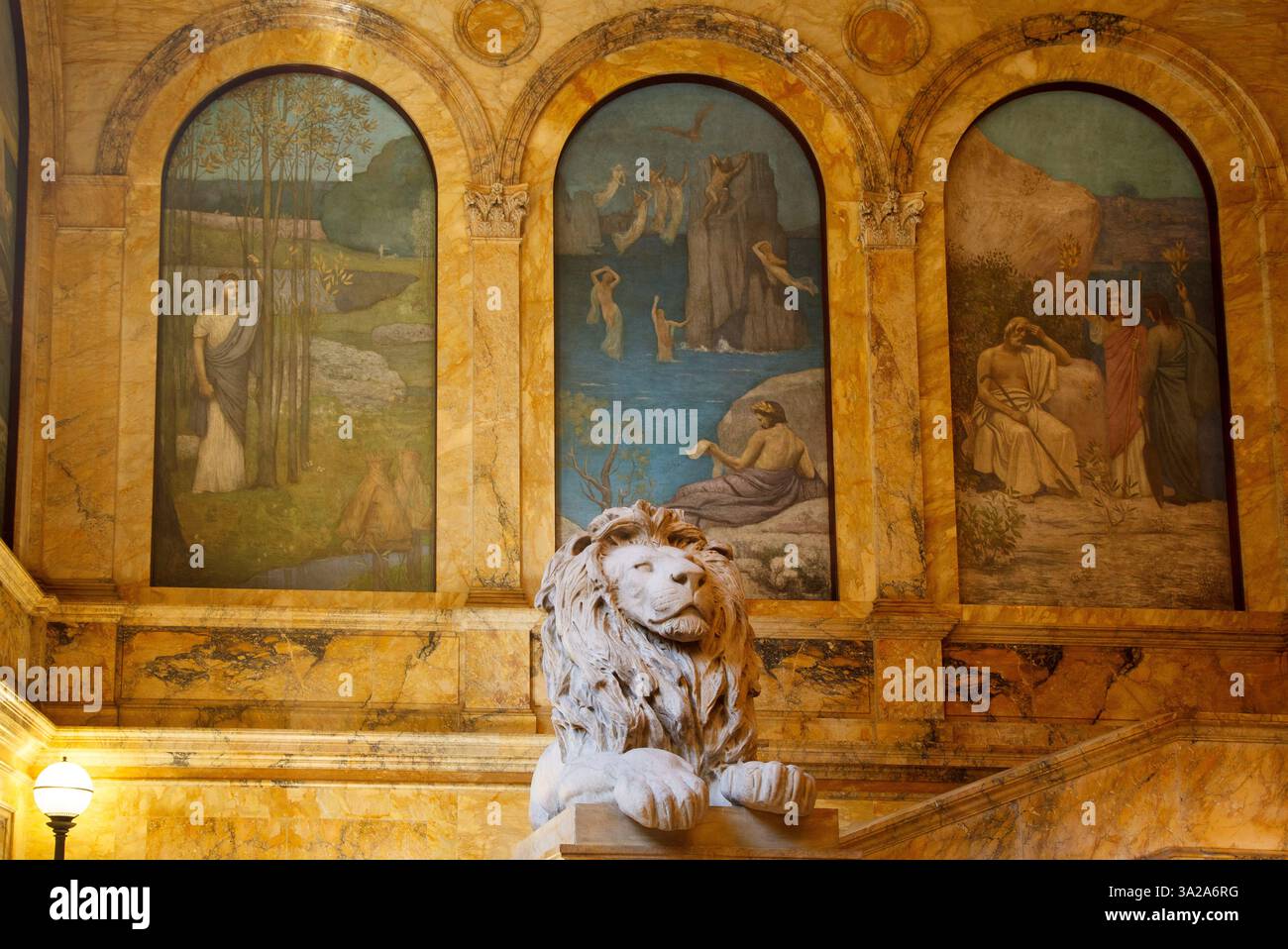 Inside the beautiful ornate Boston Public Library, a large lion ...