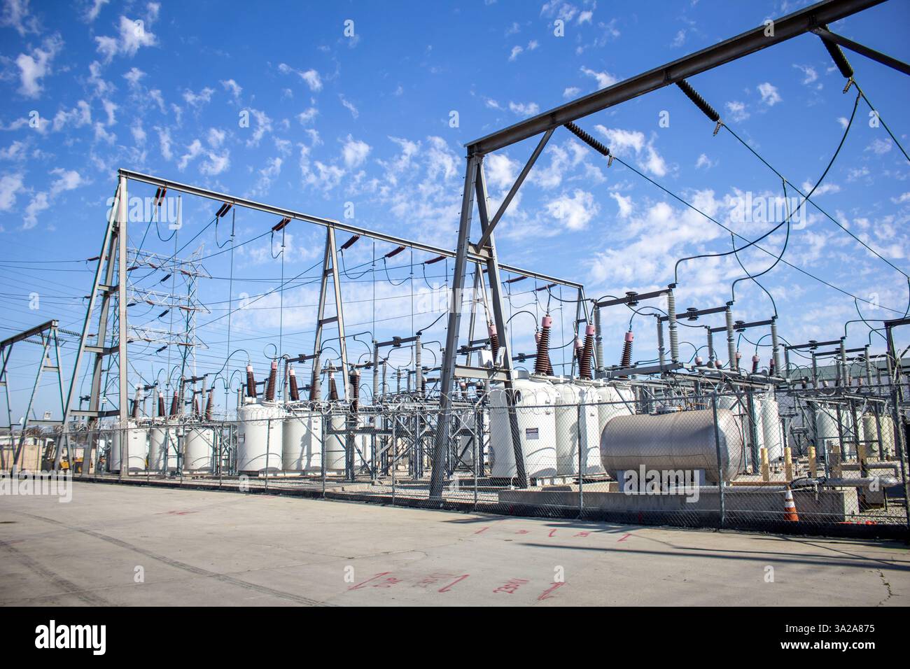 A view of a high voltage transmission and distribution station in the ...