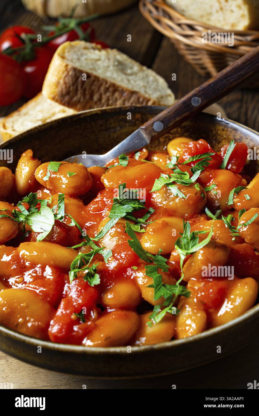 Rustic giant beans with fresh tomato sauce Stock Photo - Alamy