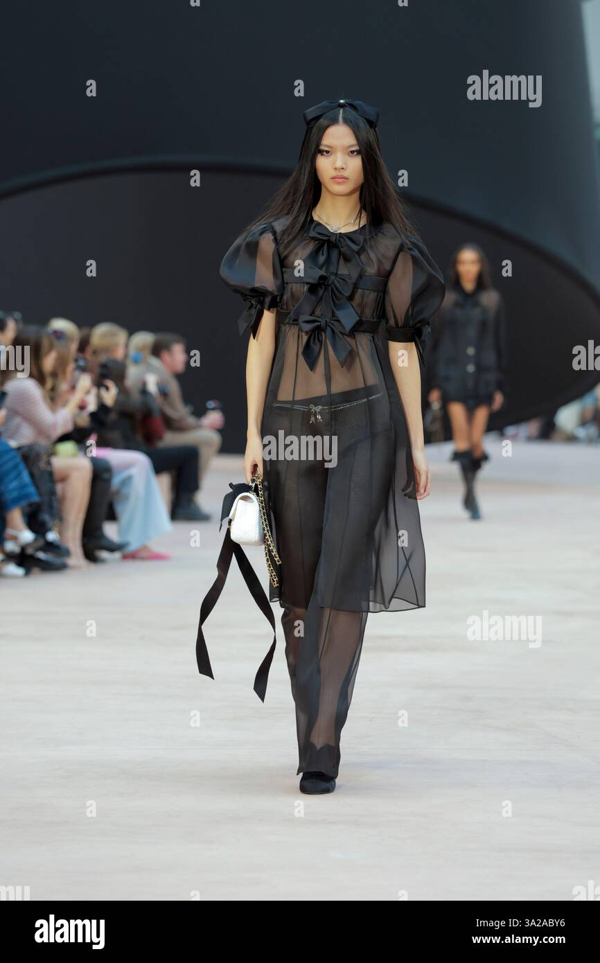 Paris, France. 11th Mar, 2025. Model Wei Yiting walks on the runway during the Chanel Ready to ...