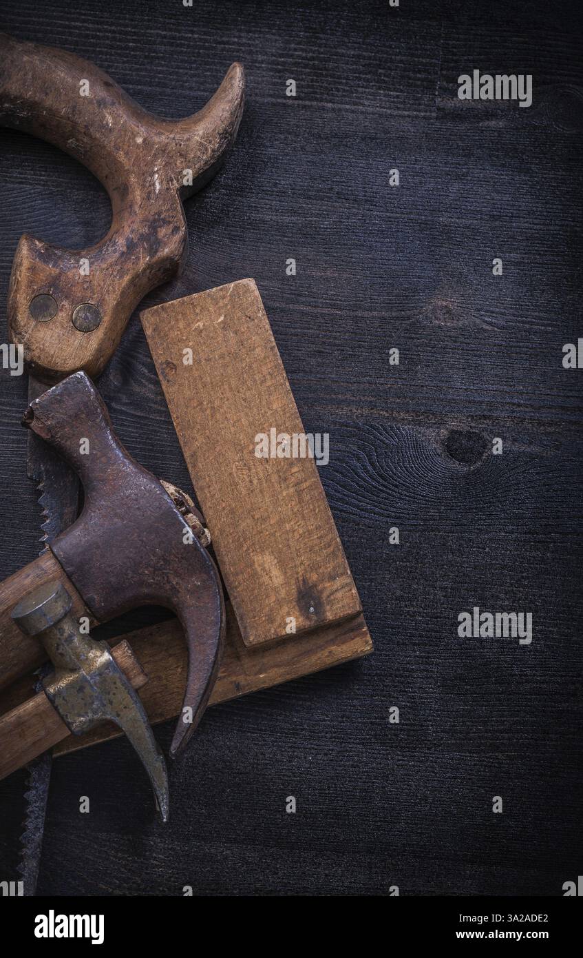 Set of vintage square ruler claw hammers hand saw Stock Photo - Alamy