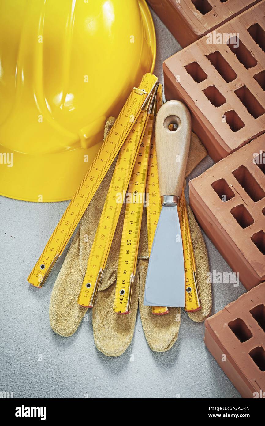 Set of bricklaying tools on concrete background building concept Stock ...