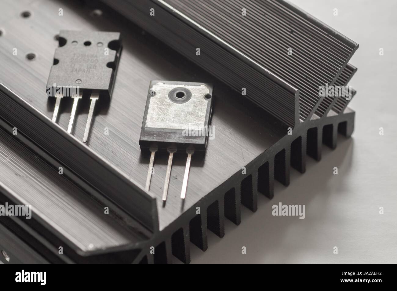 Semiconductor silicon transistors and mosfets on a powerful radiator ...