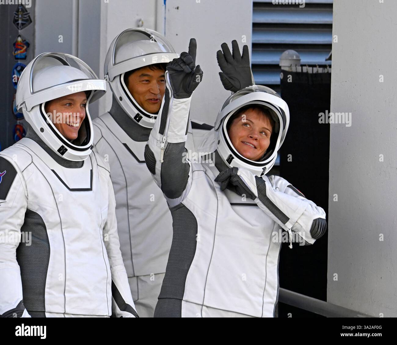 SpaceX NASA Crew-10 Commander and NASA Astronaut Anne McClain points to ...