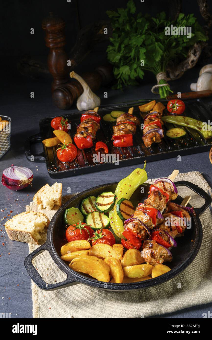 Shish kebab with various vegetables and spices Country potatoes Stock ...