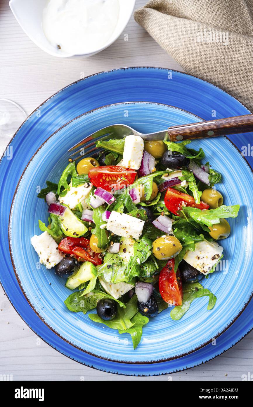 Rustic Greek salad with feta cheese Stock Photo - Alamy