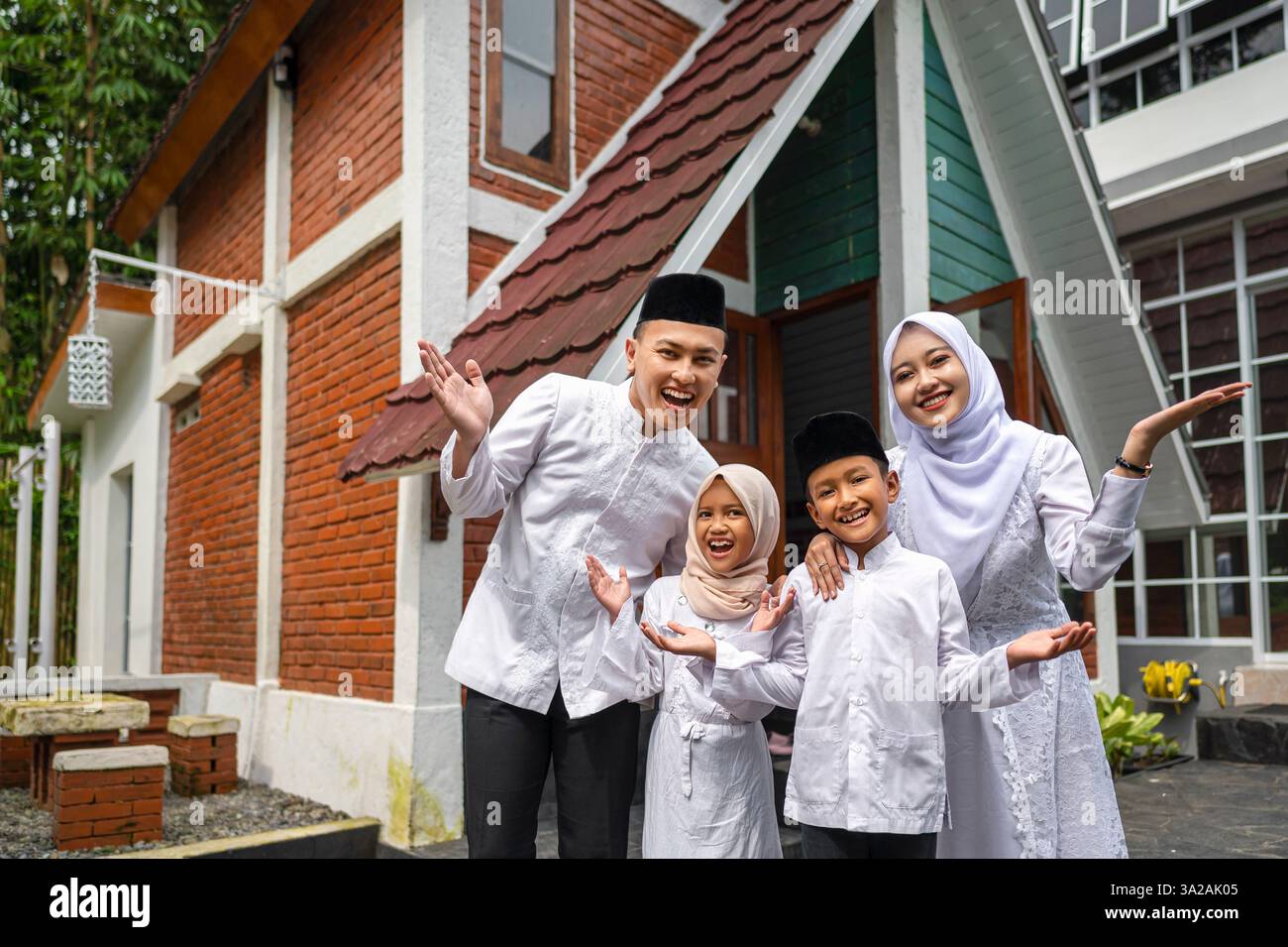 An Indonesian Muslim family arrives in their hometown. Mudik or ...