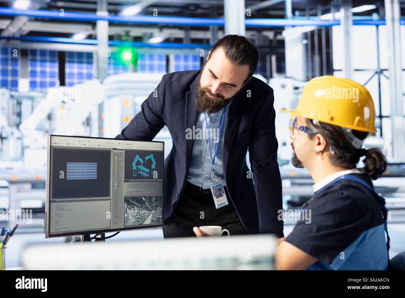 Photovoltaics factory coworkers doing brainstorming, finetuning system settings for maximum ...