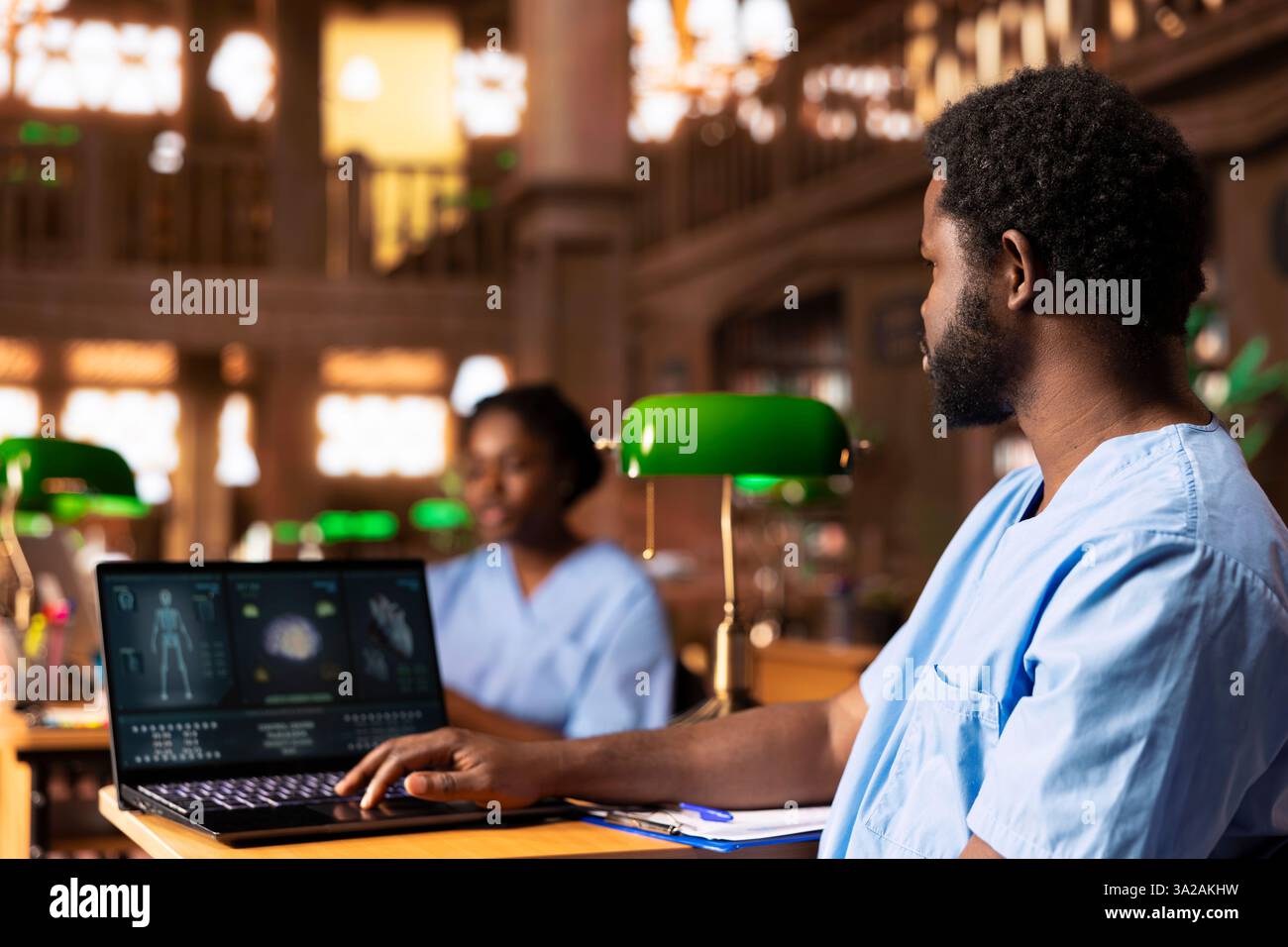 Medical assistant student prepares for exams in the university library ...