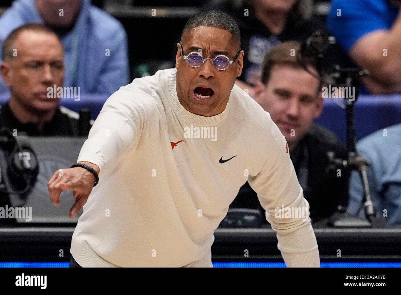 Texas head coach Rodney Terry speaks during the second half of an NCAA ...