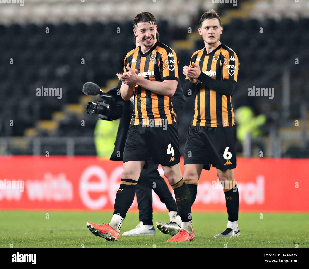 Hull, UK. 12th Mar, 2025. Charlie Hughes of Hull City celebrates after ...