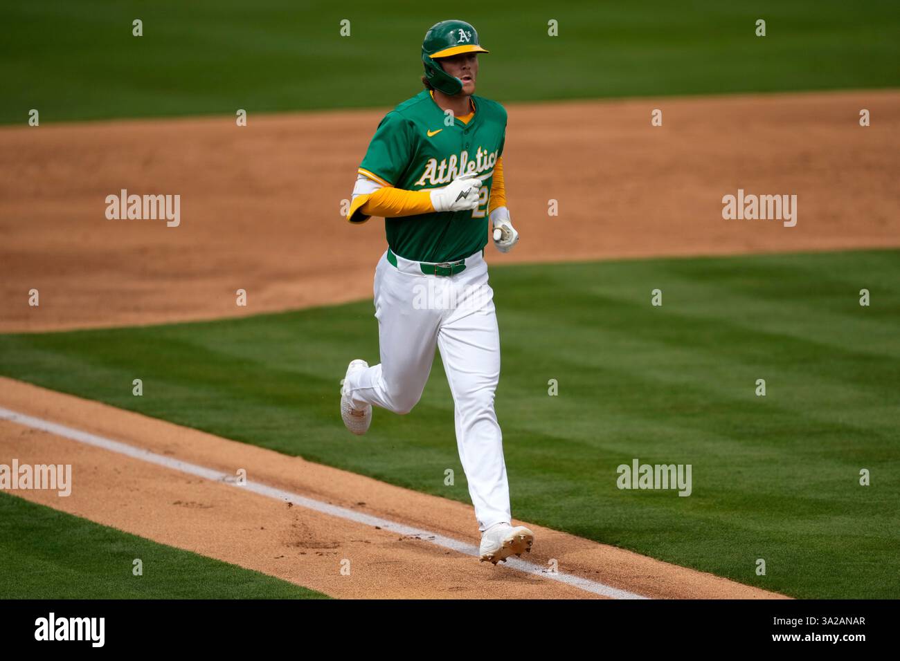 Athletics' CJ Alexander rounds the bases after hitting a solo home run ...