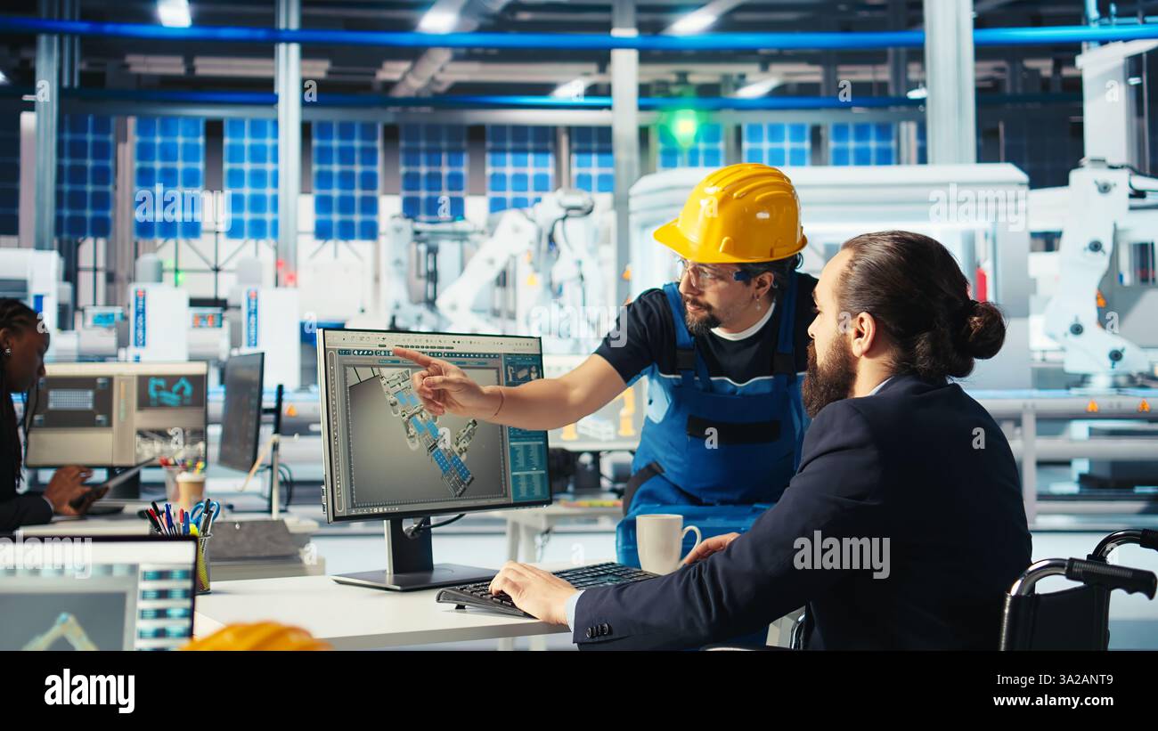 Photovoltaics factory manager with disability in wheelchair gives ...