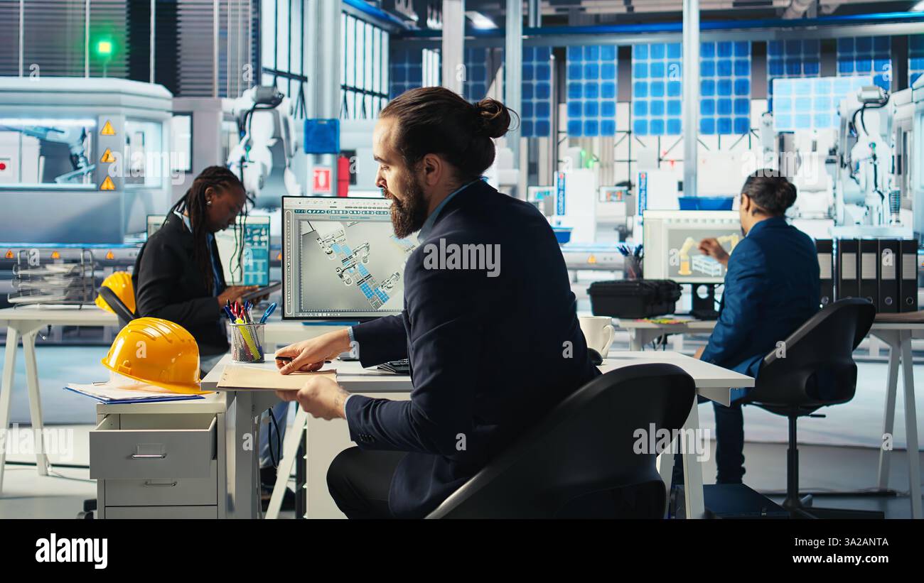 Technician in sustainable energy photovoltaics factory diagnosing ...