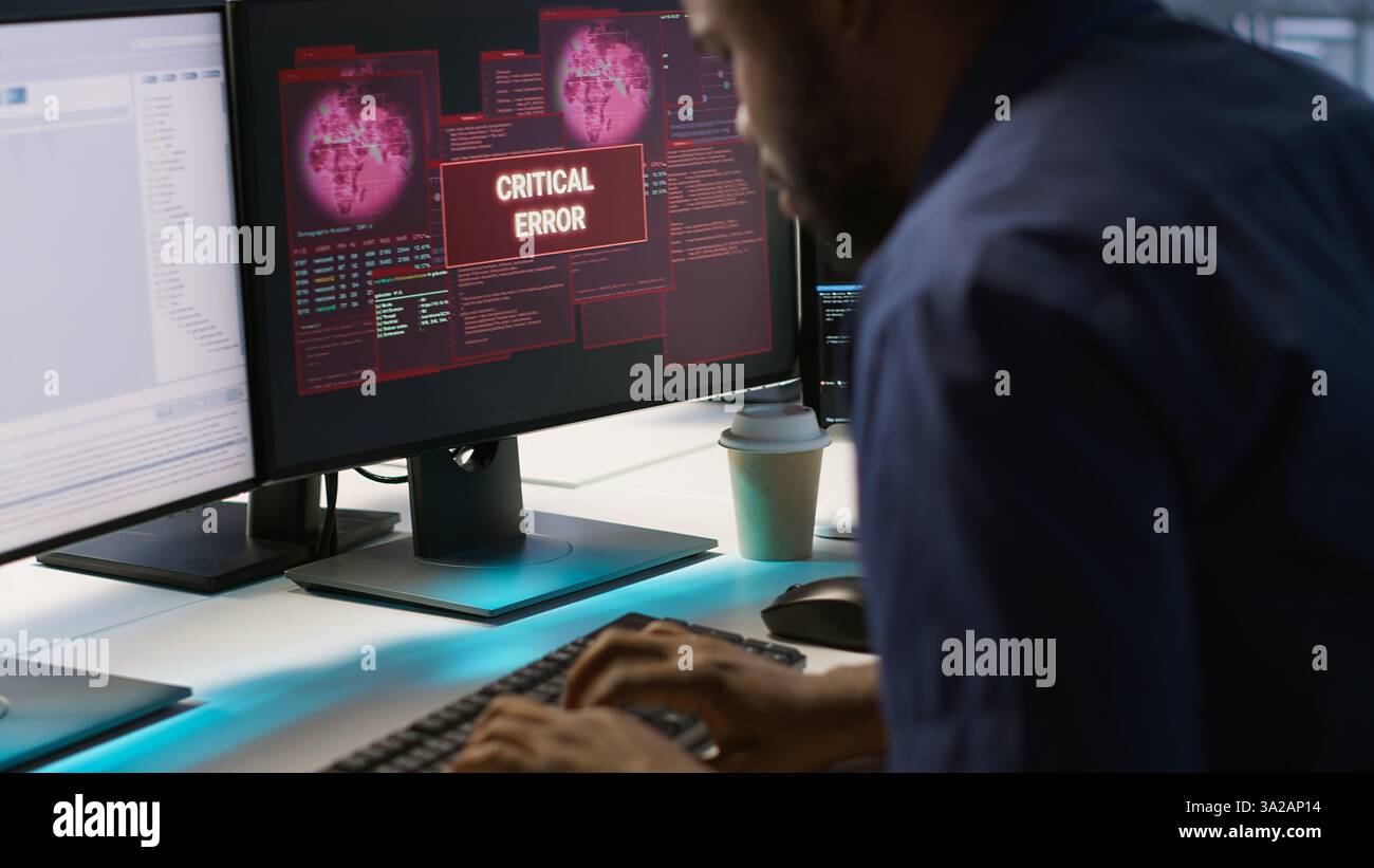 Data center programmer seeing critical hi-res stock photography and images - Alamy
