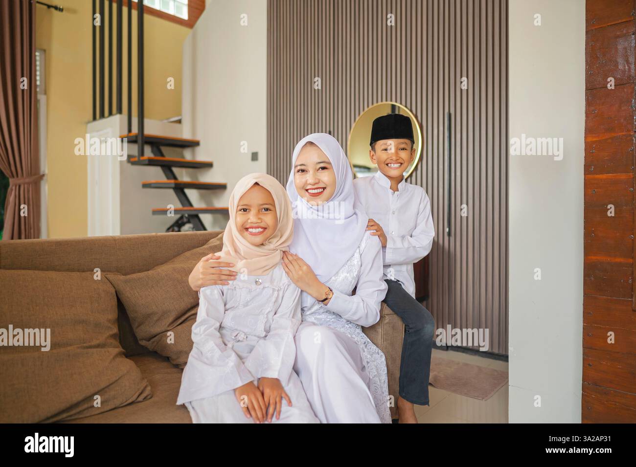 Portrait of the Indonesian Muslim mother with her child celebrating Eid ...