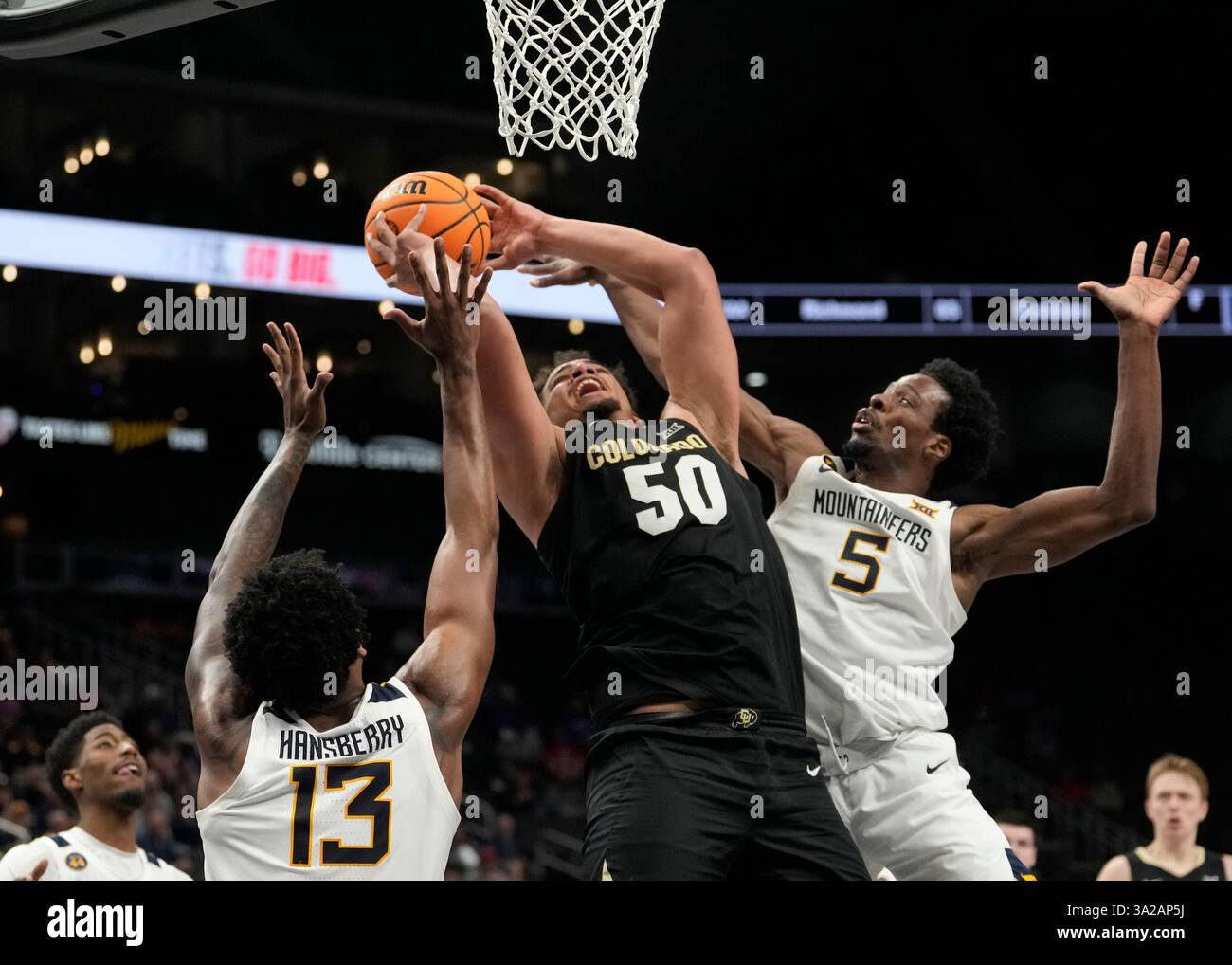 MAR 12 2025: Colorado Buffaloes center Elijah Malone (50) shoots ...
