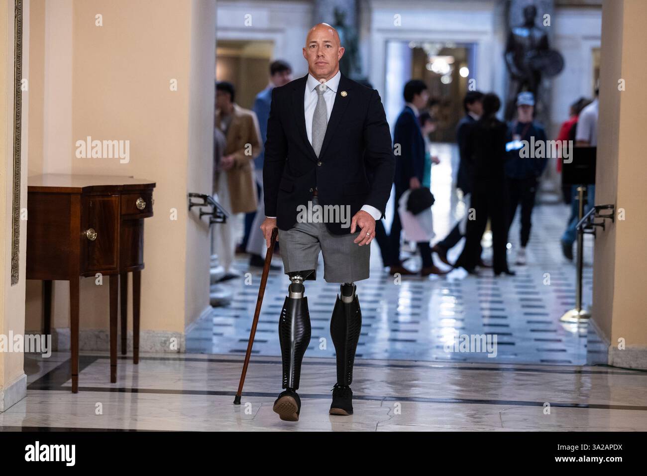 Rep. Brian Mast (R-Fla.) walks to a vote at the U.S. Capitol March 11 ...