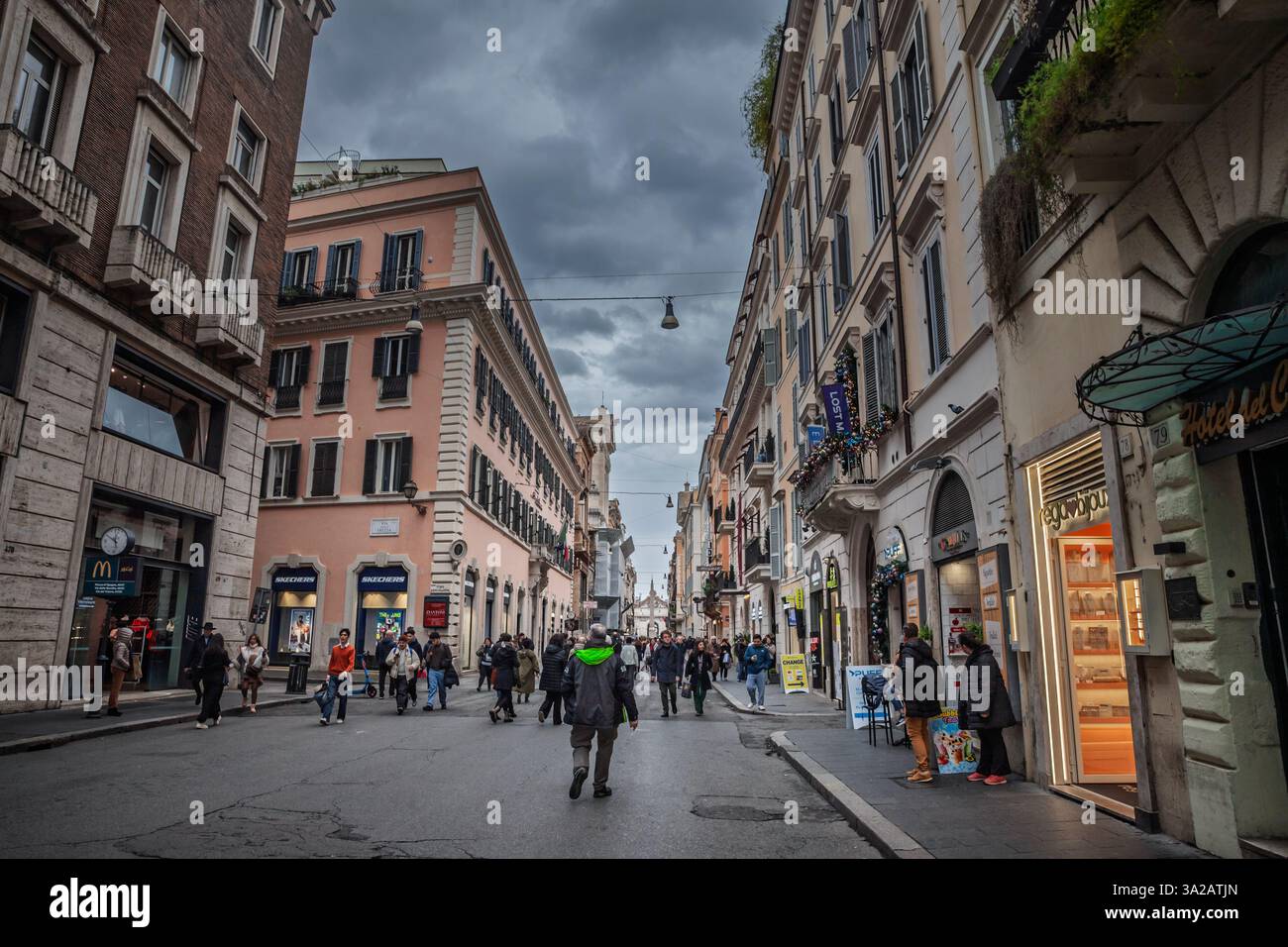 ROME, ITALY - JANUARY 15, 2025: Pedestrians walking along Via del Corso ...