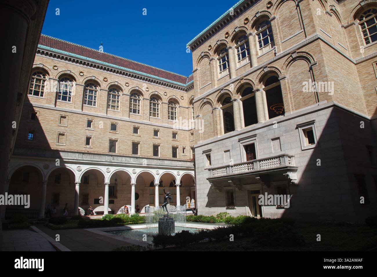 The beautiful internal garden with a fountain of the Boston Public ...
