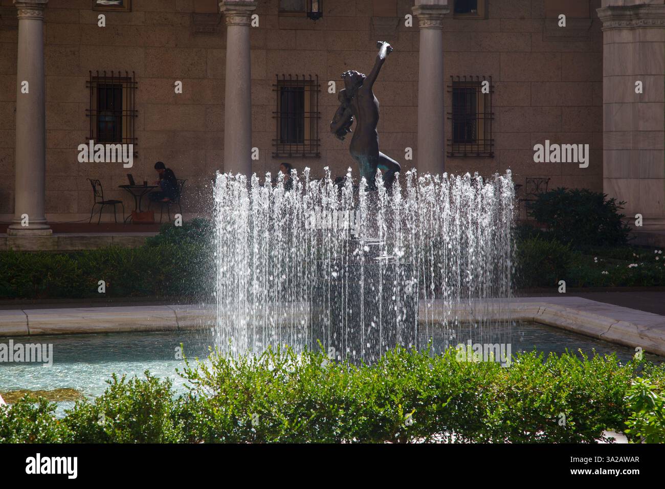 The beautiful internal garden with a fountain of the Boston Public ...