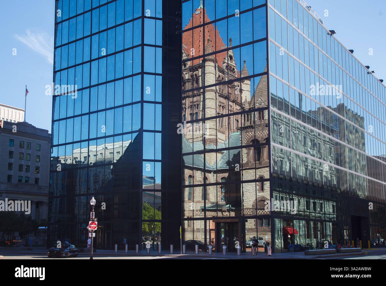 The Trinity church in Copley Square reflected on John Hancock tower ...