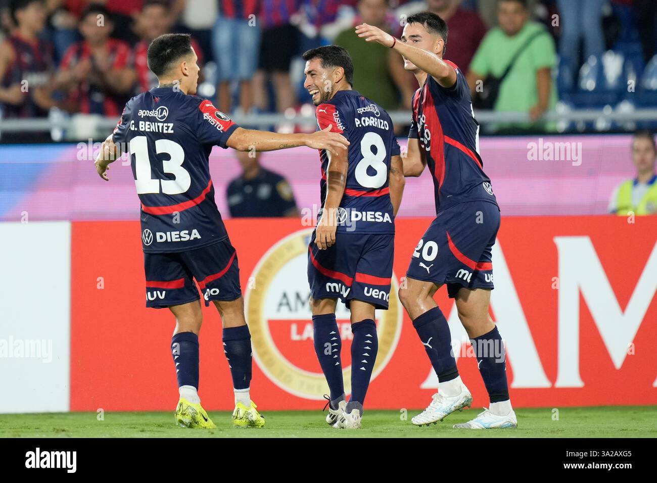 Federico Carrizo of Paraguay's Cerro Porteno, center, celebrates after ...