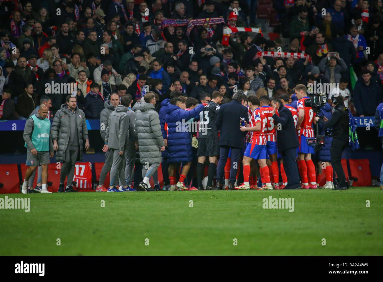 Madrid, Spain, March 12, 2025: Atlético de Madrid players listen to ...