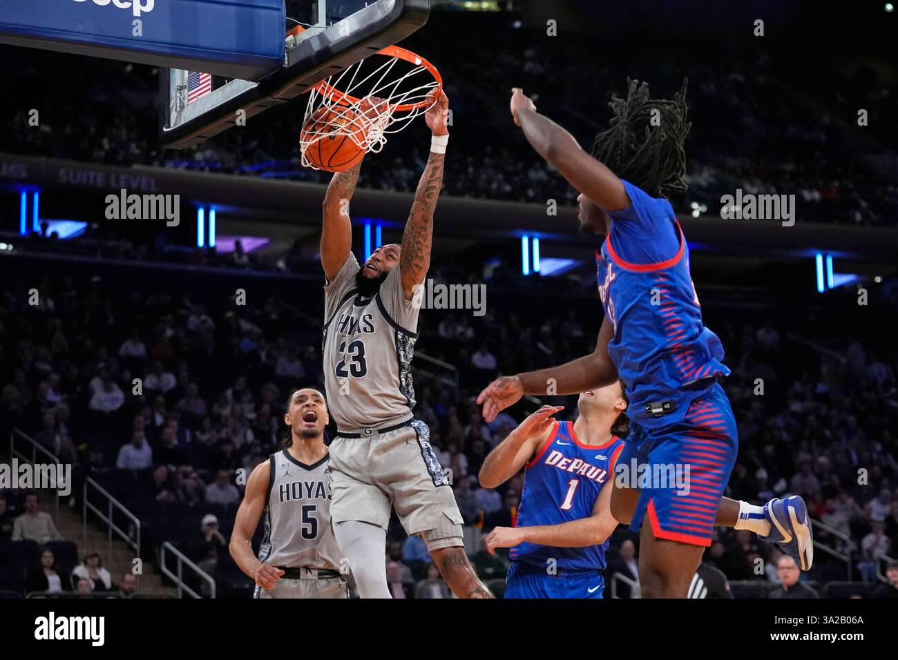 Georgetown's Jordan Burks (23) dunks the ball in front of DePaul's ...