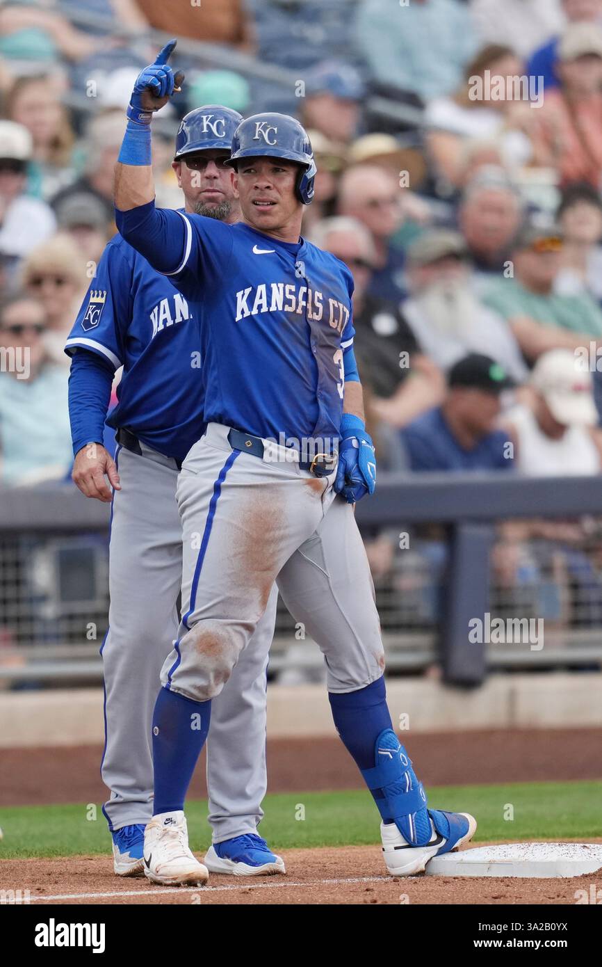 Kansas City Royals' Freddy Fermin, right, celebrates his triple against ...