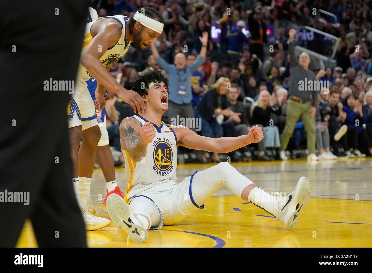 Golden State Warriors forward Gui Santos (15) celebrates with guard ...
