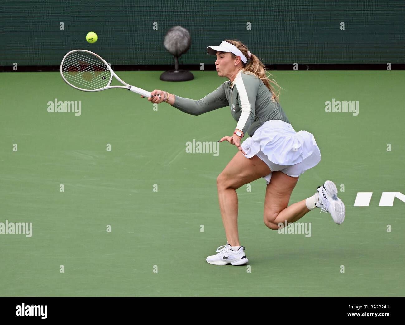 INDIAN WELLS, CA - MARCH 12: Donna Vekic (CRO) returns a shot during a ...