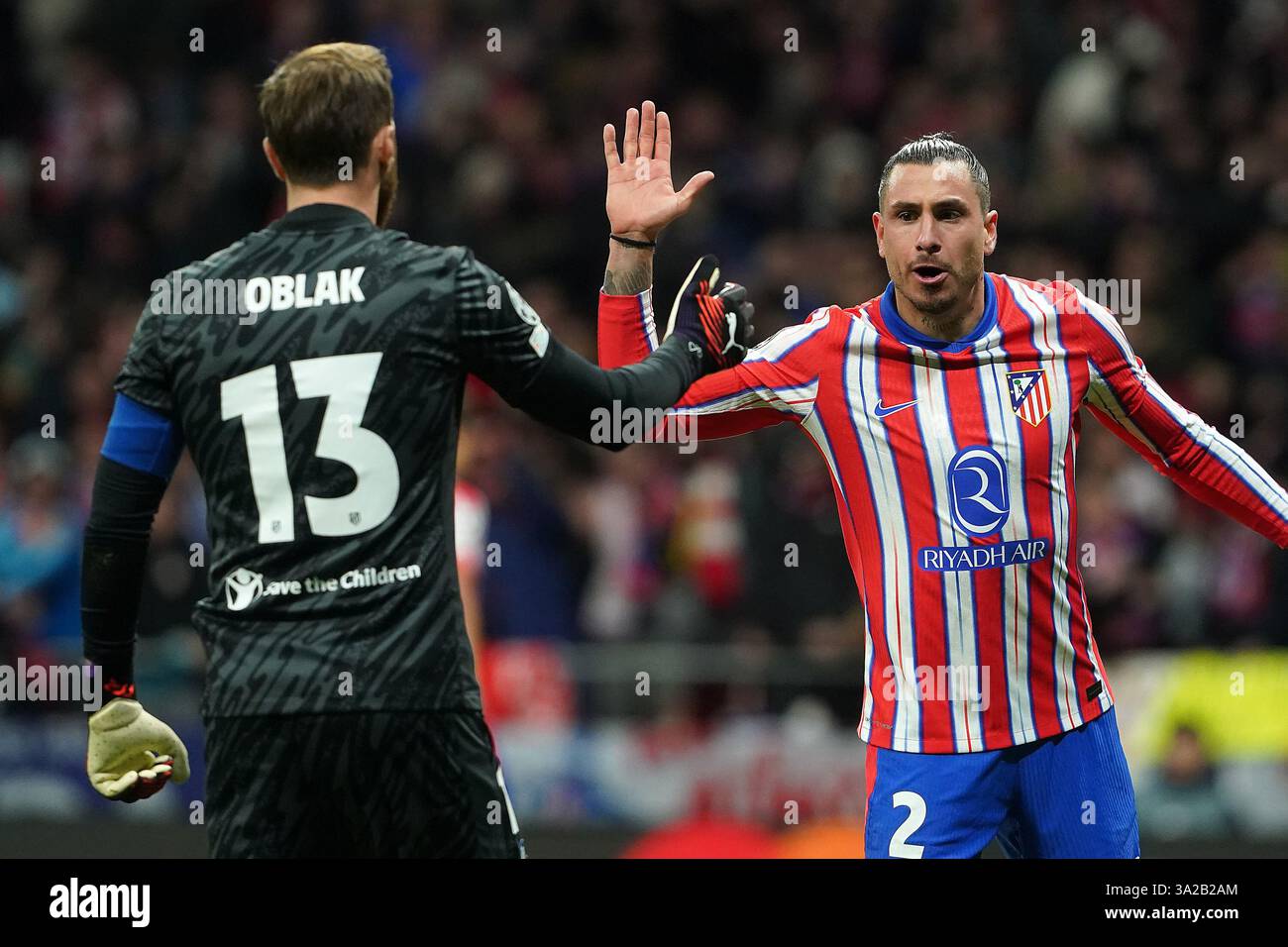 Madrid, Spain. 12th Mar, 2025. Atletico de Madrid's Jan Oblack and Jose ...