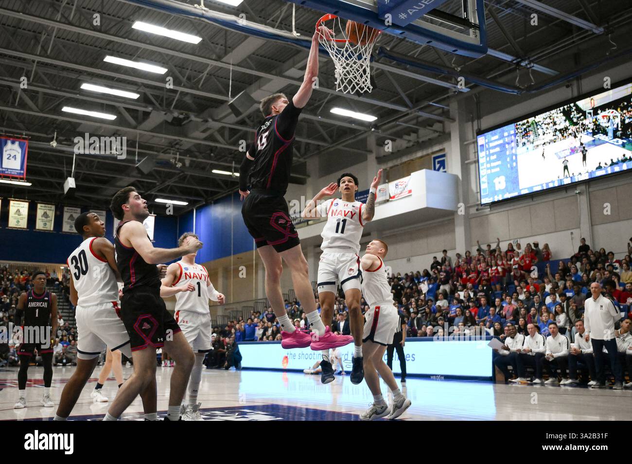 American forward Matt Rogers (15) dunks the ball during the first half ...