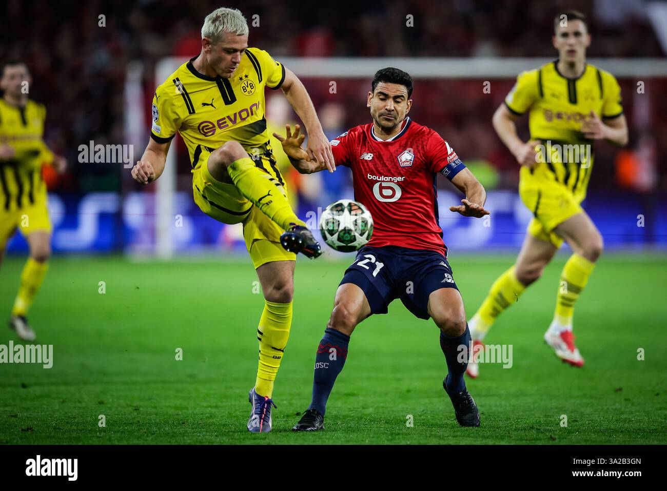 Julian RYERSON of Borussia Dortmund and Benjamin ANDRE of Lille during ...
