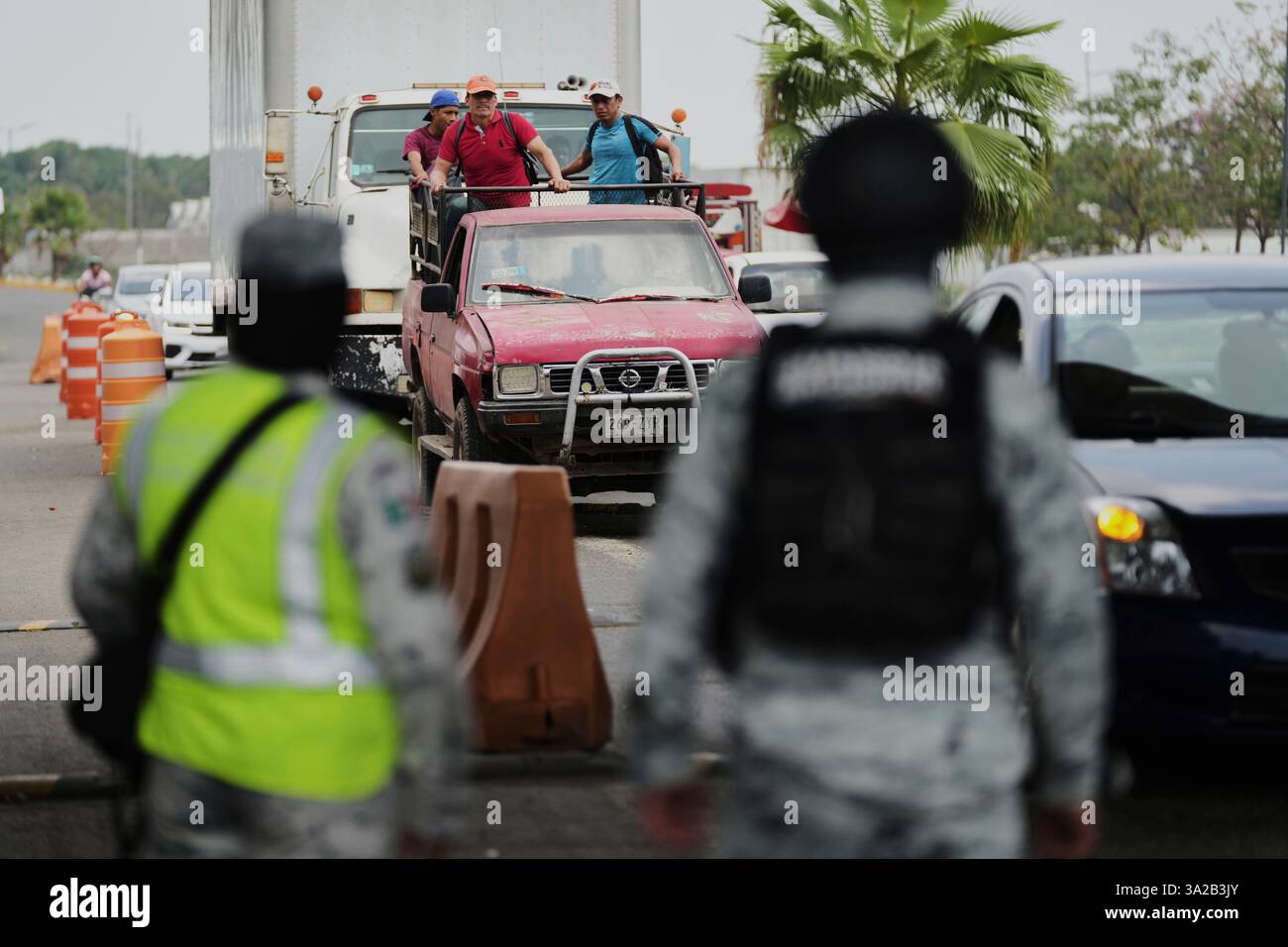National Guards patrol an immigration checkpoint on the outskirts of ...