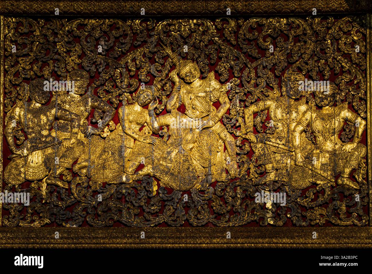 Luang Prabang temple carving, Laos. Golden artwork, traditional design ...