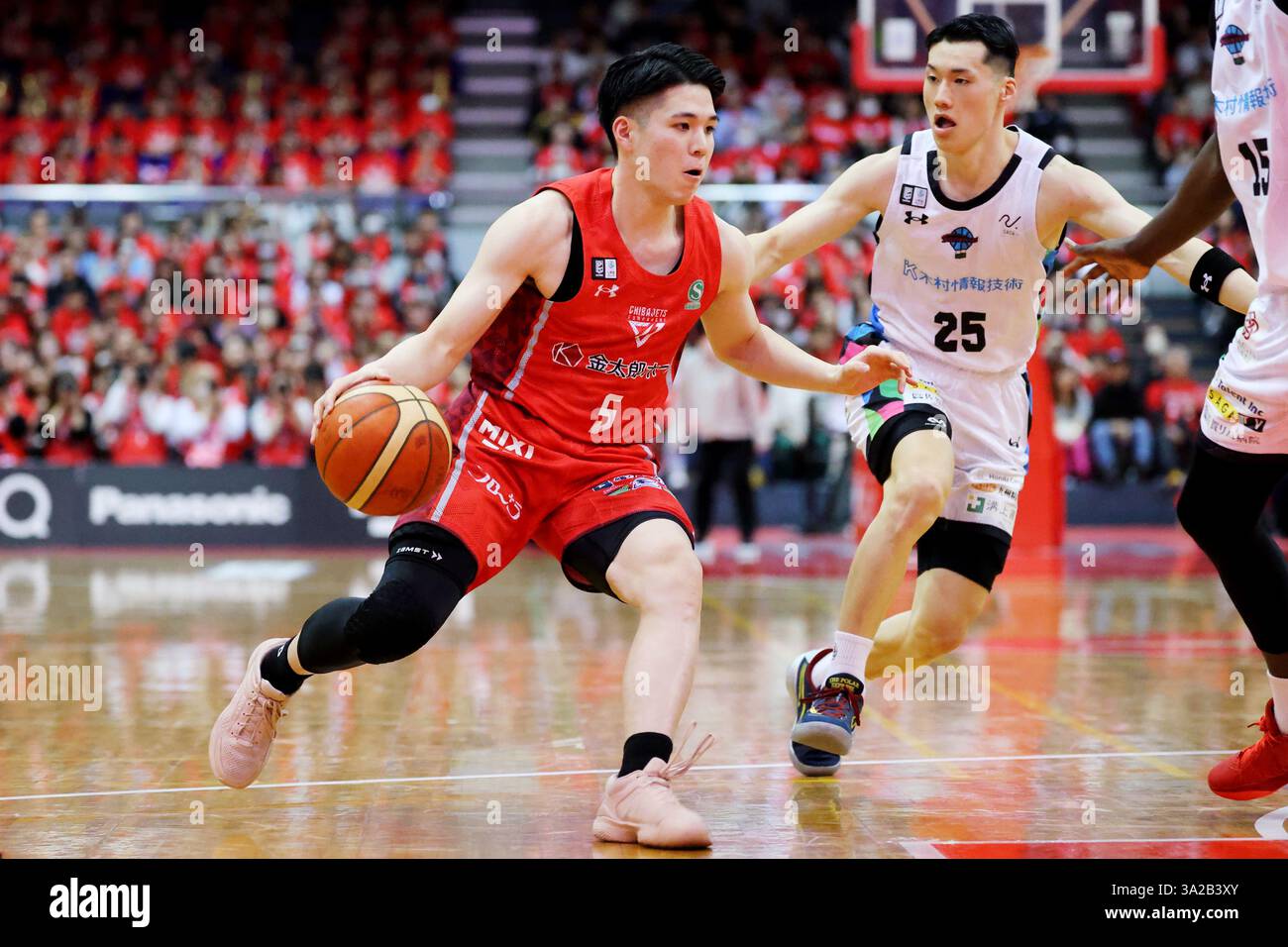 Chiba, Japan. 12th Mar, 2025. (L-R) Riku Segawa (Jets), Taiki Sumida ...