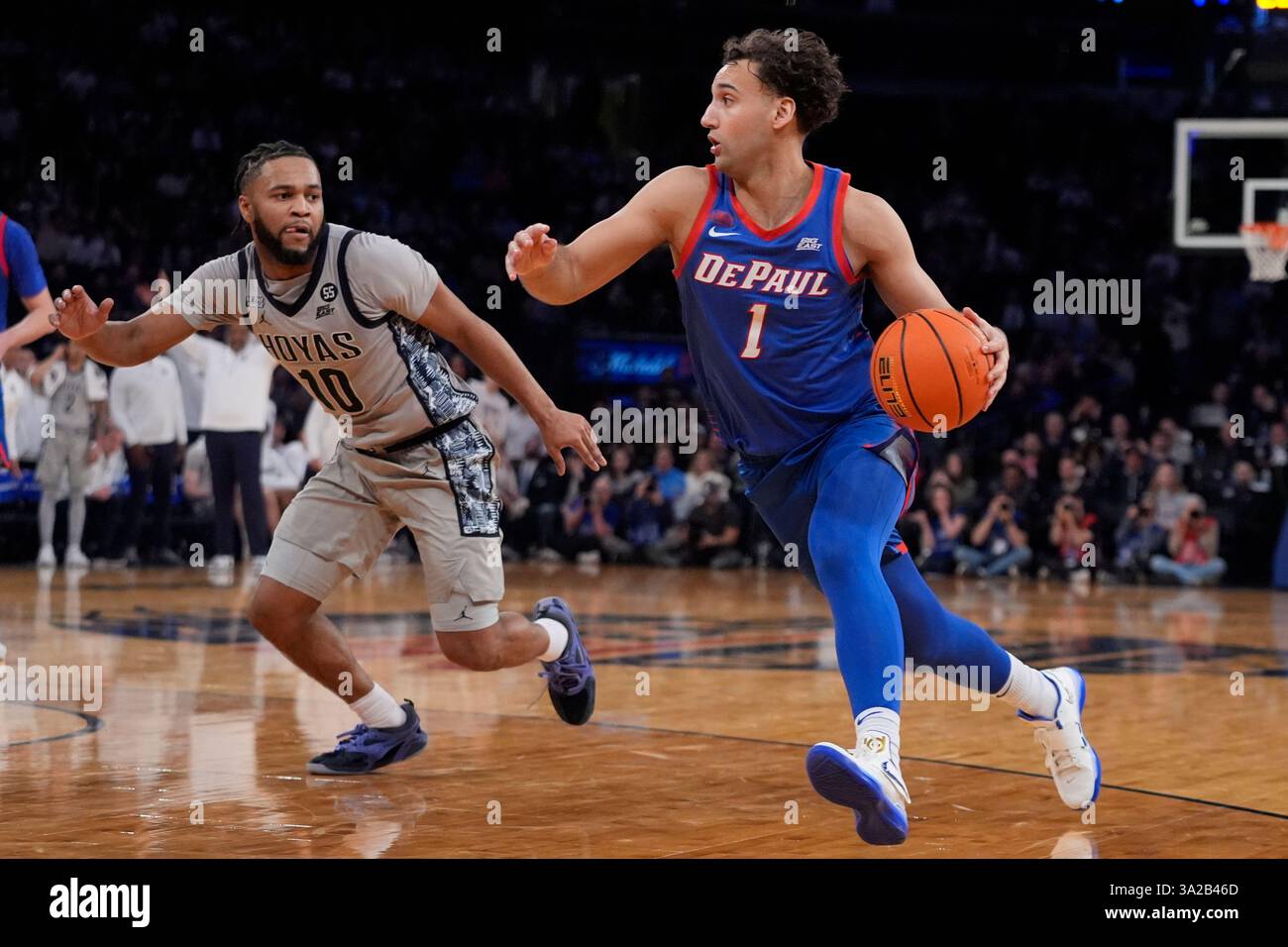 DePaul's Isaiah Rivera (1) drives past Georgetown's Jayden Epps (10 ...