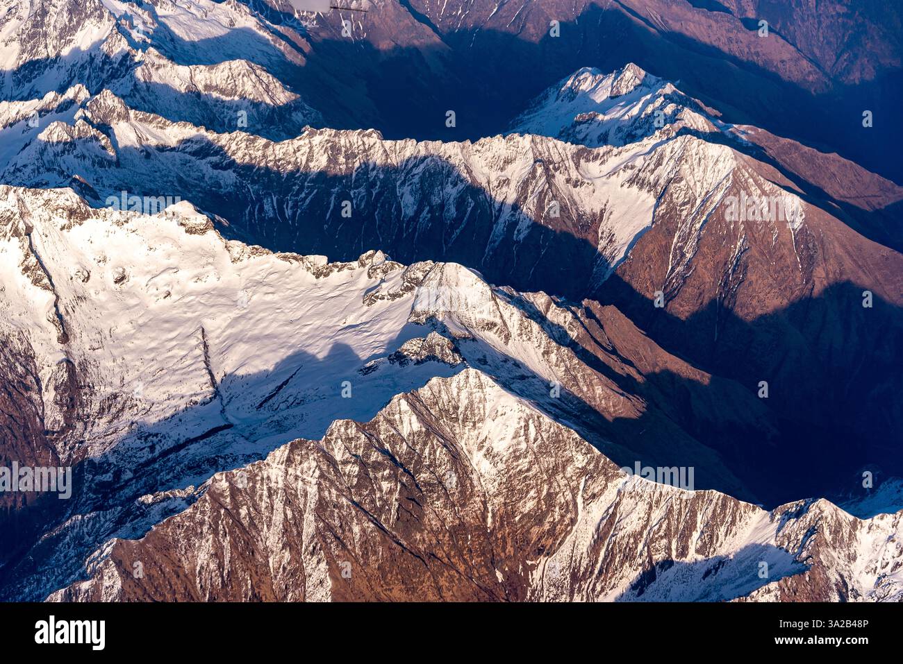 Flying above the Alps, from Italy to The Netherlands Stock Photo - Alamy