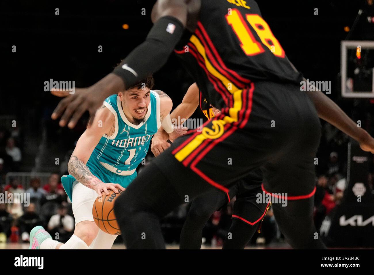Atlanta Hawks forward Jalen Johnson (1) dribbles the ball in the first ...