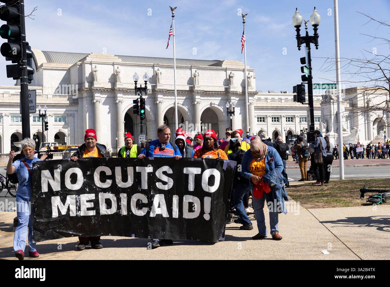 Hundreds of protesters are marching against the cut of Medicaid and ...