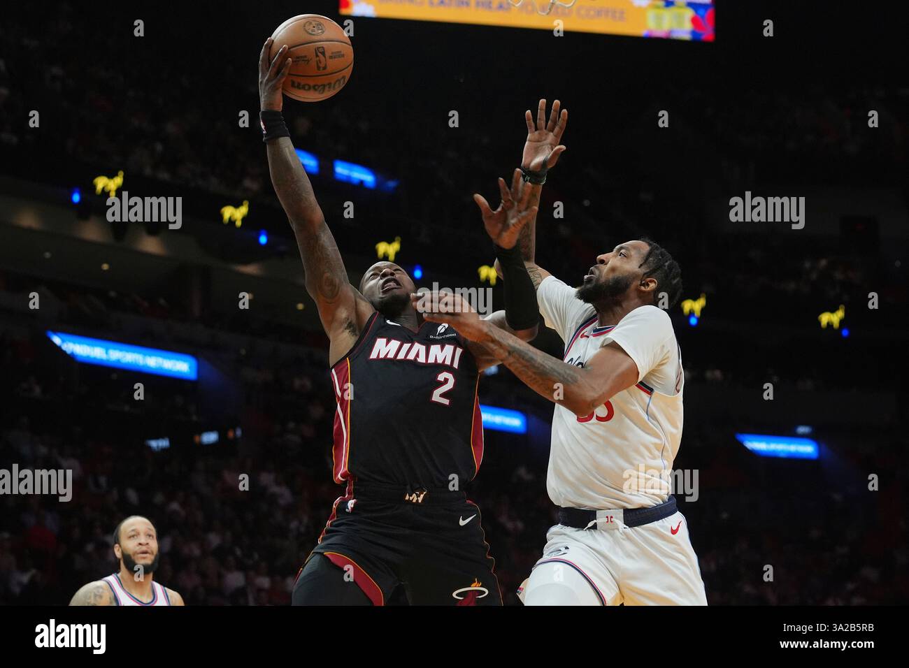 Miami Heat guard Terry Rozier (2) drives to the basket as LA Clippers ...