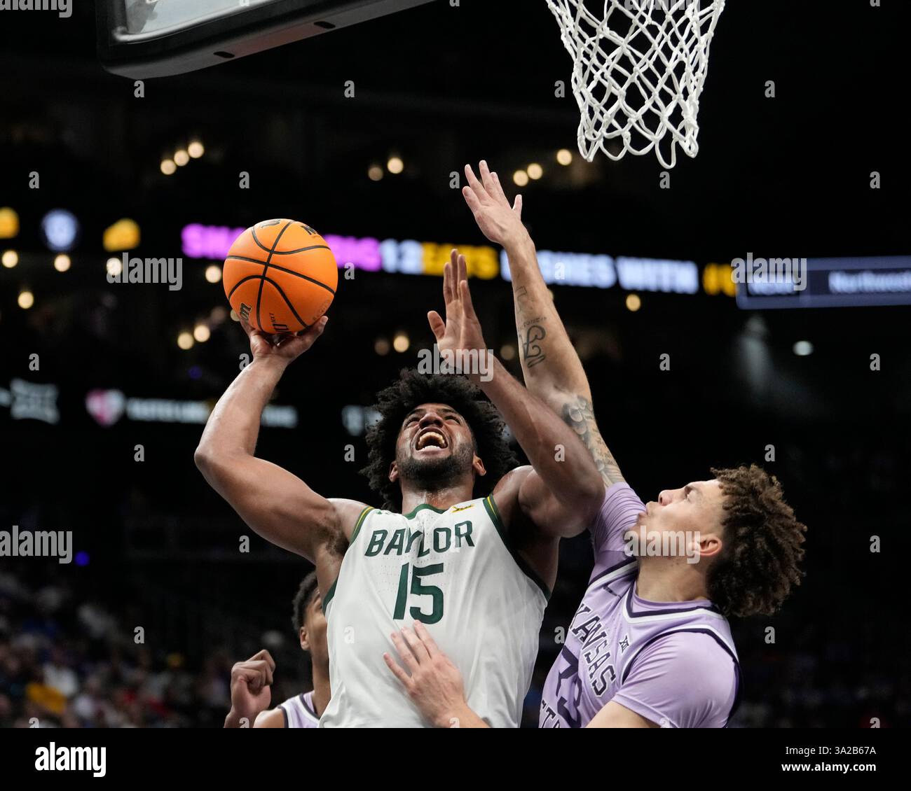 MAR 12 2025: Baylor Bears forward Norchad Omier (15) fights through ...